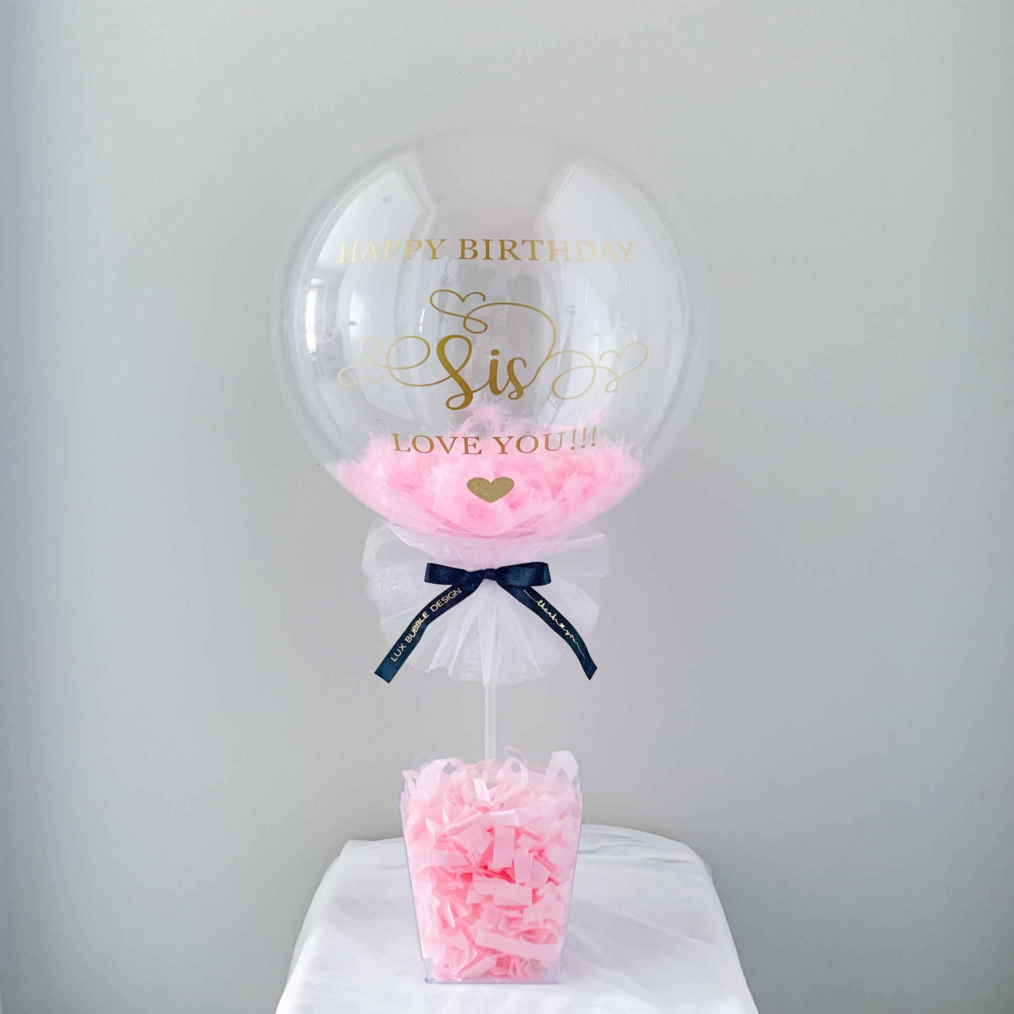 balloon with feathers